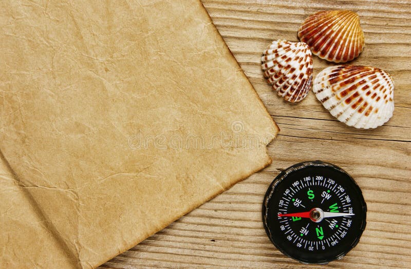 Piece of Paper and Compass with Sea Shells Stock Photo - Image of ...