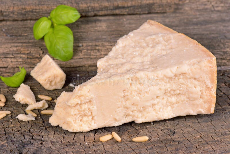 Piece of parmesan cheese stock photo. Image of wood, nuts - 38753292