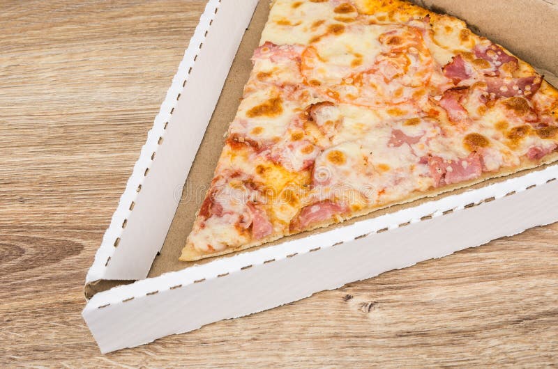 Piece of Pizza in Carton Box on Table Stock Photo - Image of container ...