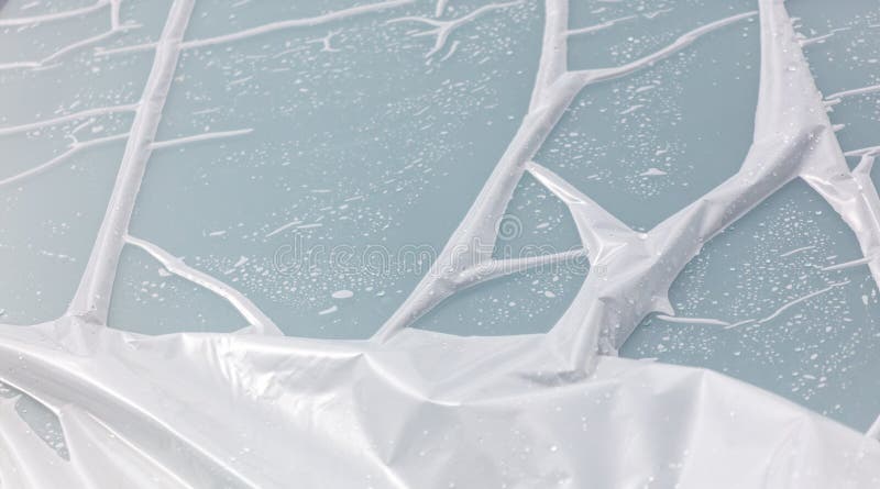 A Piece of Plastic that Has Been Torn and is Covered in Ice Stock Image ...