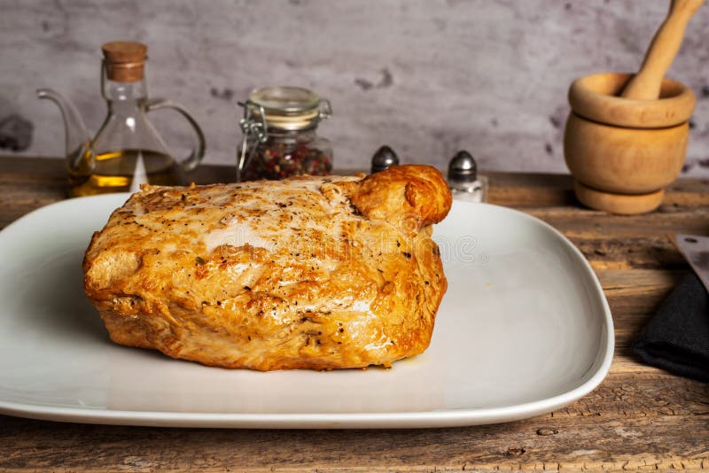 Piece of Pork Loin with Beer Fresh Out of the Pot, on a Rustic ...