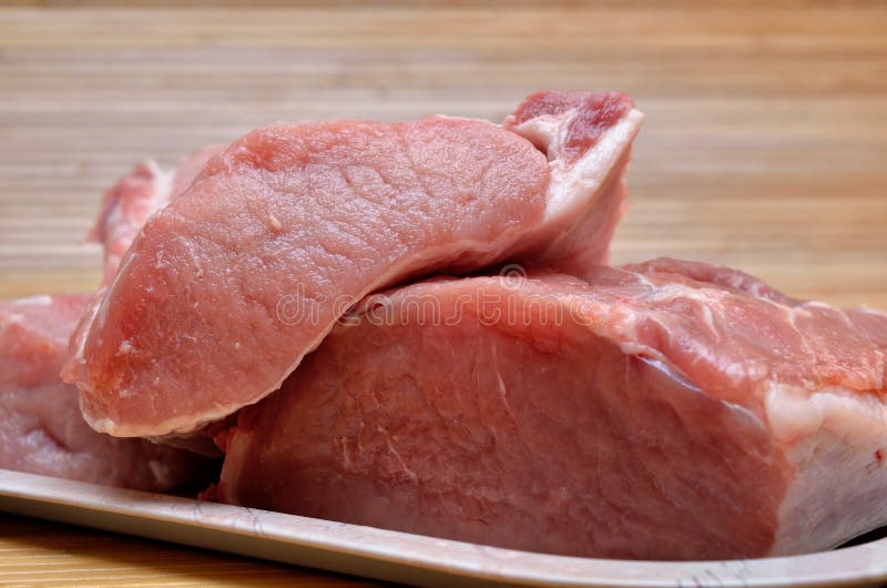 A Piece of Raw Meat on a Cutting Kitchen Table Stock Photo - Image of ...