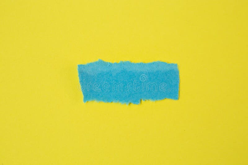 Piece of a Rectangular Blue Paper on Yellow Stock Image - Image of ...