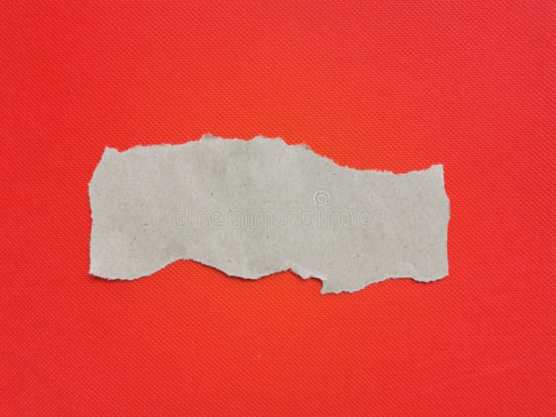 A Piece of Rip Brown Paper with Copy Space for Wording Isolated on Red ...