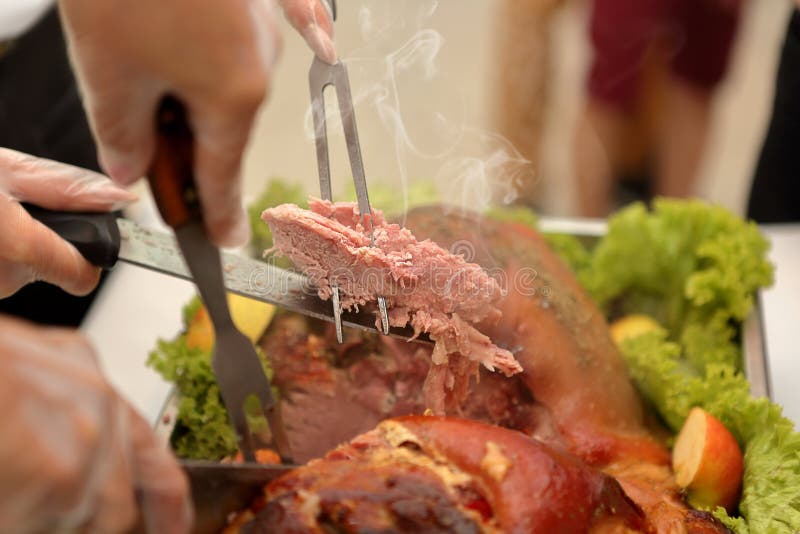 Piece of Roasted Pork Ham at the Party or Wedding Reception Waiter ...