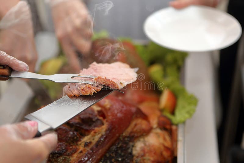 Piece of Roasted Pork Ham at the Party or Wedding Reception Waiter ...