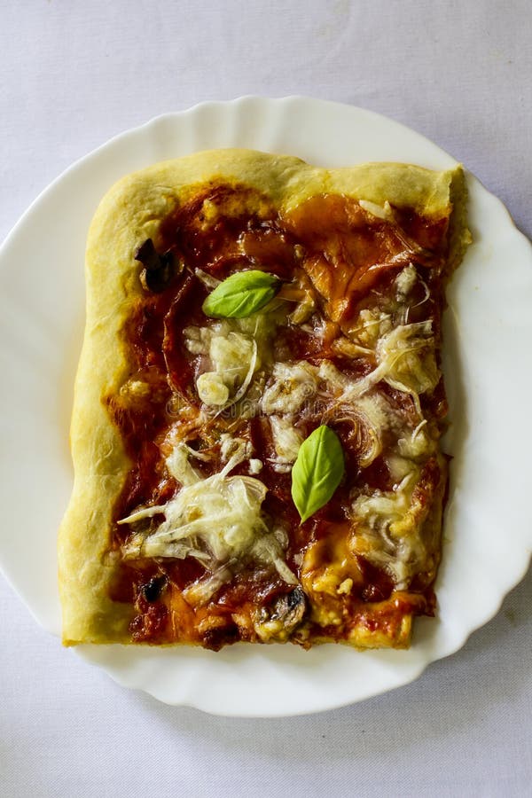 Piece of Roman Style Pizza on a White Plate Stock Image - Image of ...