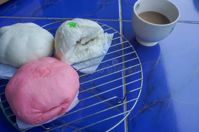 A Piece of Steamed Bun in the Morning with a Cup of Hot Coffee Stock ...