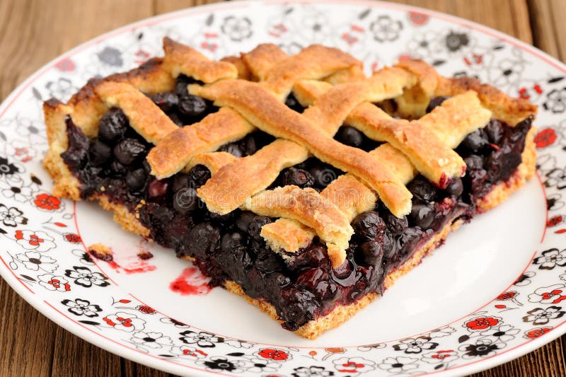 Piece of Triangular Homemade Lattice Pie with Whole Wild Blueberries ...