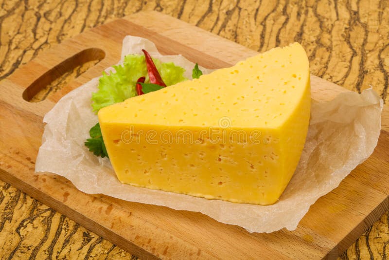 Stuk van kaas stock afbeelding. Afbeelding bestaande uit deel - 4171605