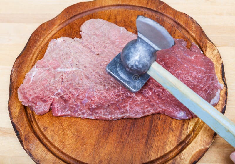 Piece of Veal is Beating by Meat Mallet Stock Photo - Image of beef ...