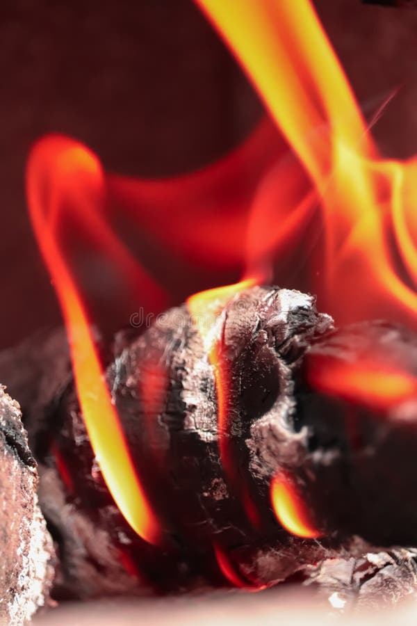 Piece of Wood Burning in Fire Lit by Sunlight Placed Diagonally Stock ...