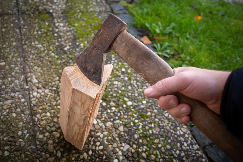 A Piece of Wood is Split with an Axe Stock Image - Image of blade ...
