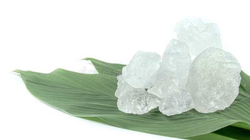 Pieces of Alum Stone on Green Leaf Against White Background. this Image ...