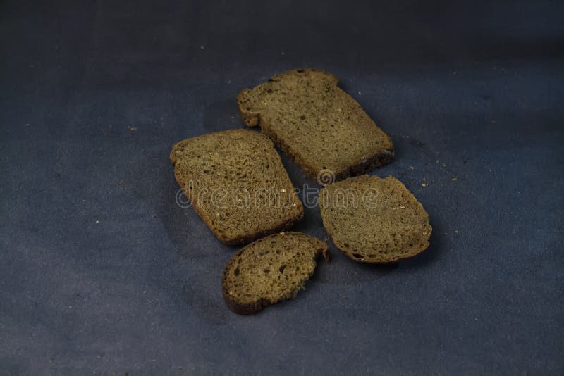 Pieces of Bread on a Blue Background Stock Photo - Image of piece ...