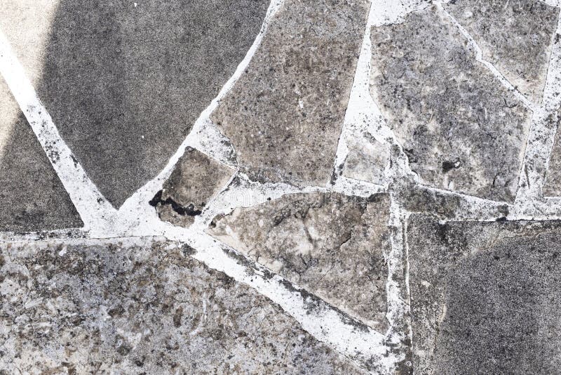 Broken Flat Stones Set in White Cement Pavement. Background and ...