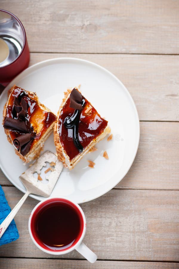Pieces of Cake, Metal Paddle and Cup of Tea Stock Photo - Image of ...
