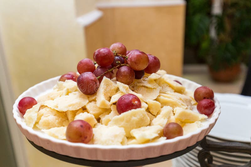 Pieces of Cheese and Grapes Stock Image - Image of onion, hole: 60344673
