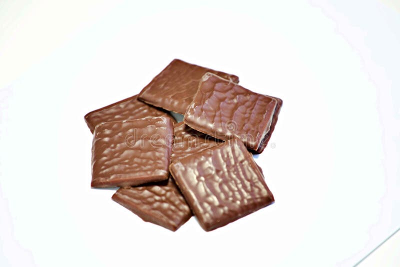 Square pieces of chocolate stock photo. Image of brown - 179186310