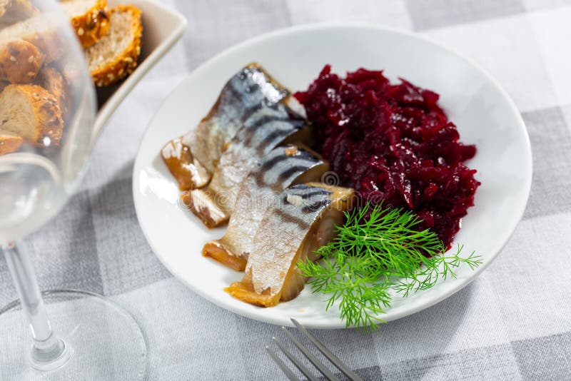 Pieces of Chopped Scomber with Beet Served on Plate Stock Photo - Image ...