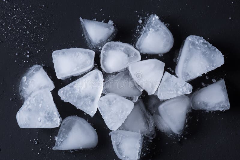 Pieces of Crushed Ice Cubes on Black Background Stock Image - Image of ...