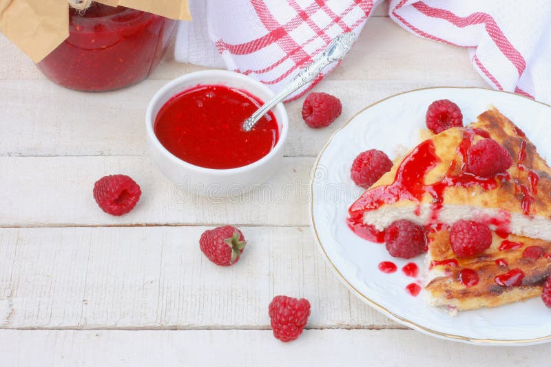 Pieces of Curd Pudding with Raspberry Jam Closeup Stock Photo - Image ...