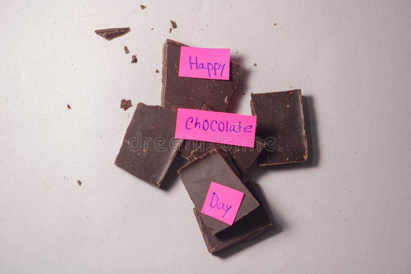 Wishing Happy Chocolate Day with Chocolates Stock Image - Image of hand ...