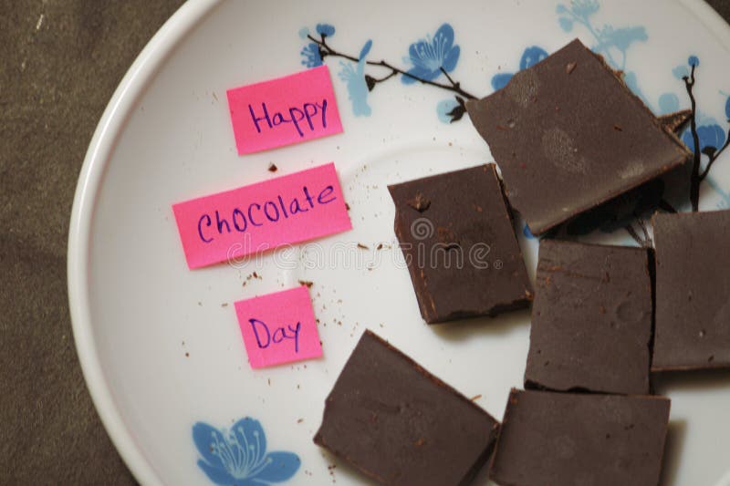 Wishing Happy Chocolate Day with Chocolates Stock Photo - Image of ...