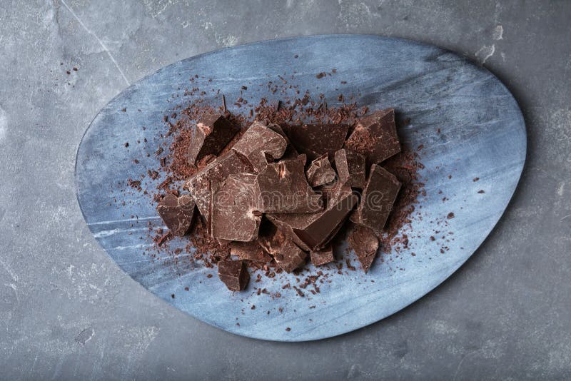 Pieces of Dark Chocolate on Grey Board Stock Image - Image of nutrition ...