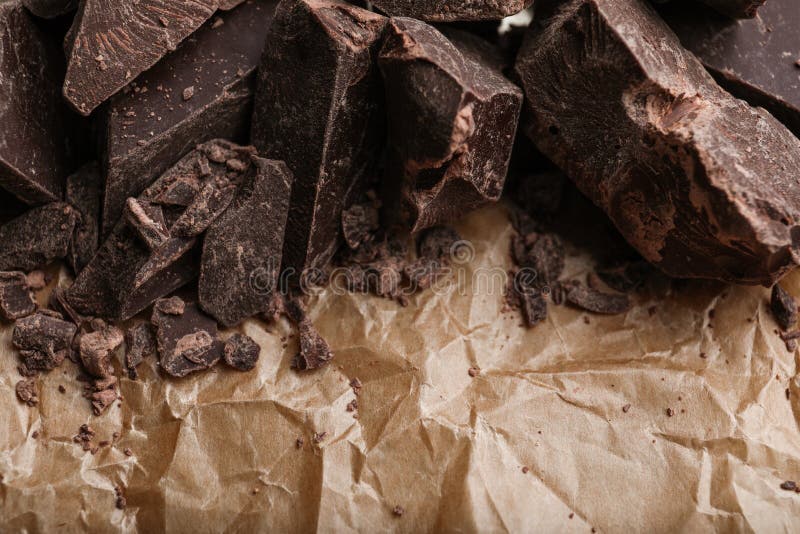 Pieces of Dark Chocolate on Parchment Stock Photo - Image of ...