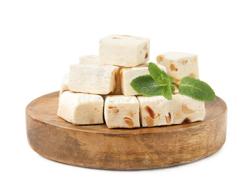Pieces of Delicious Nougat and Mint Isolated on White Stock Image ...