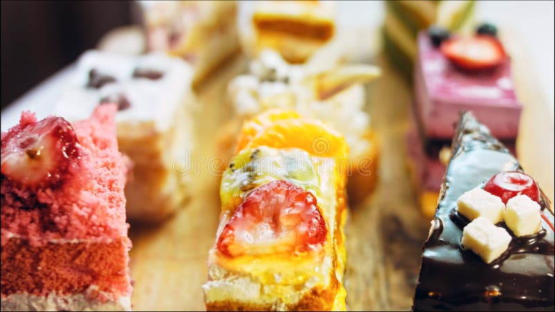 Pieces of Different Cakes on a Retro-style Baking Tray. Slider and ...