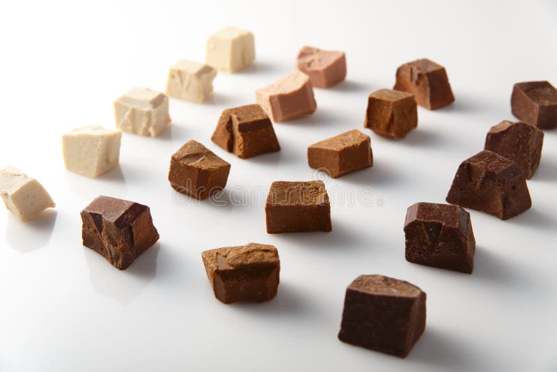 Pieces of Different Milk Chocolate Stock Photo - Image of brown, cube ...