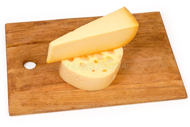 Two Pieces of Various Semi-hard Cheese on Cutting Board Stock Image ...