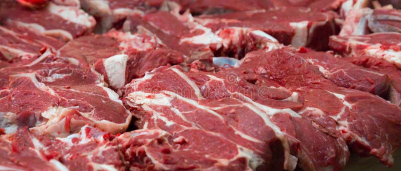 Pieces of Fresh Beef Lying on the Counter on the Market. Red Meat Stock ...