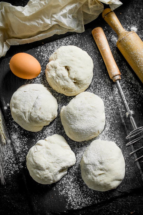 Pieces of fresh dough stock photo. Image of pastry, pizza - 146046994