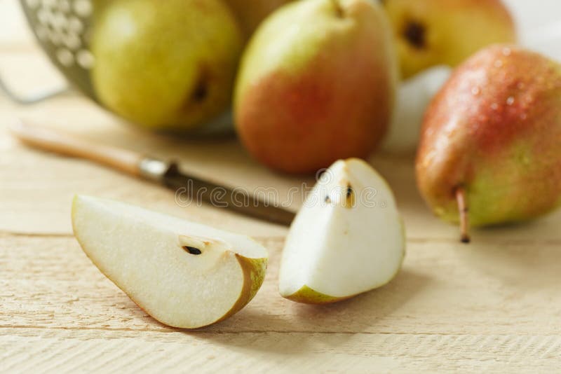 Pieces of Fresh Pear on the Kitchen Table Stock Photo - Image of ...