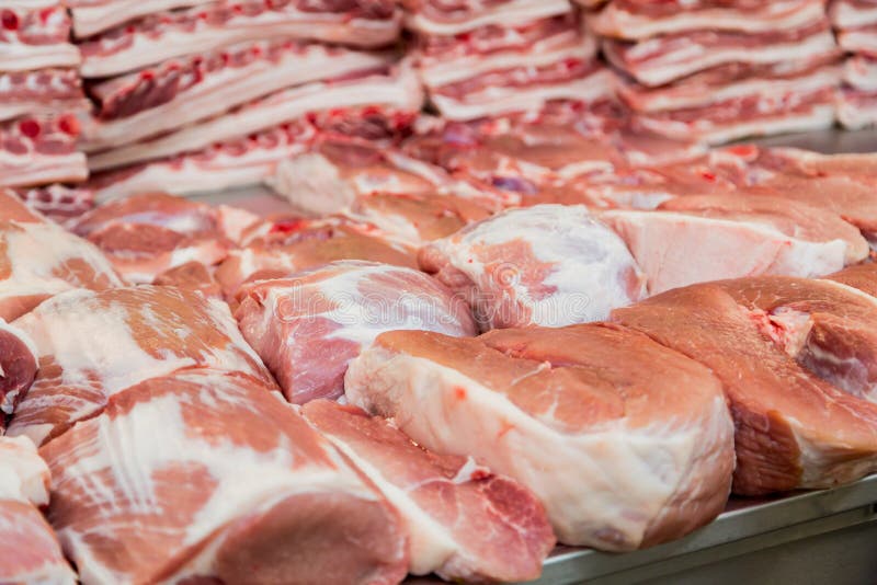 Assortment of Pork Meat in Showcase at Supermarket Stock Photo - Image ...