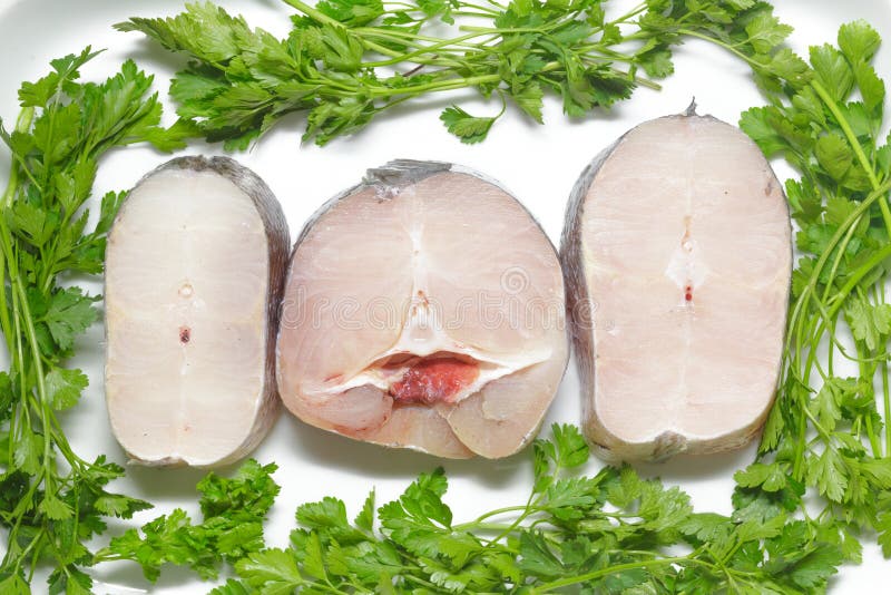 Pieces of Fresh Raw Hake with Parsley Isolated on White Dish Stock ...