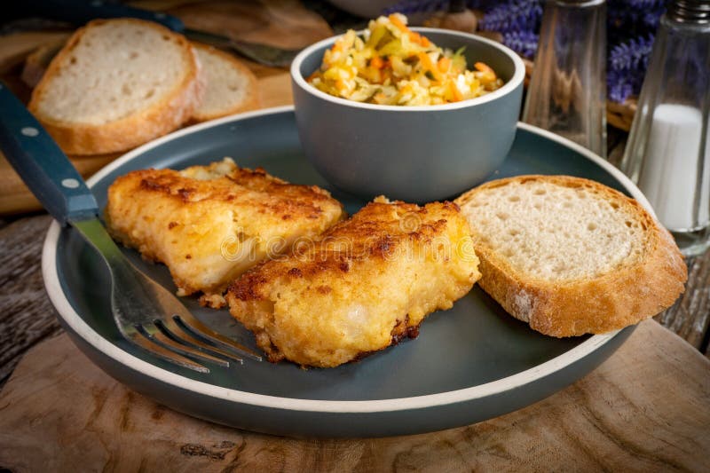 Pieces of fried cod fillet stock photo. Image of dish - 274488820