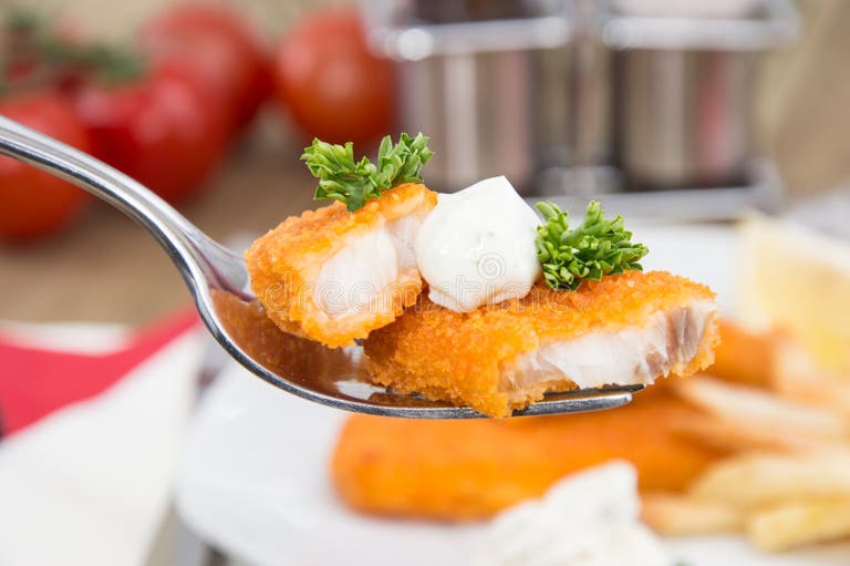 Pieces of Fried Fish on a Fork Stock Image - Image of brown, dinner ...
