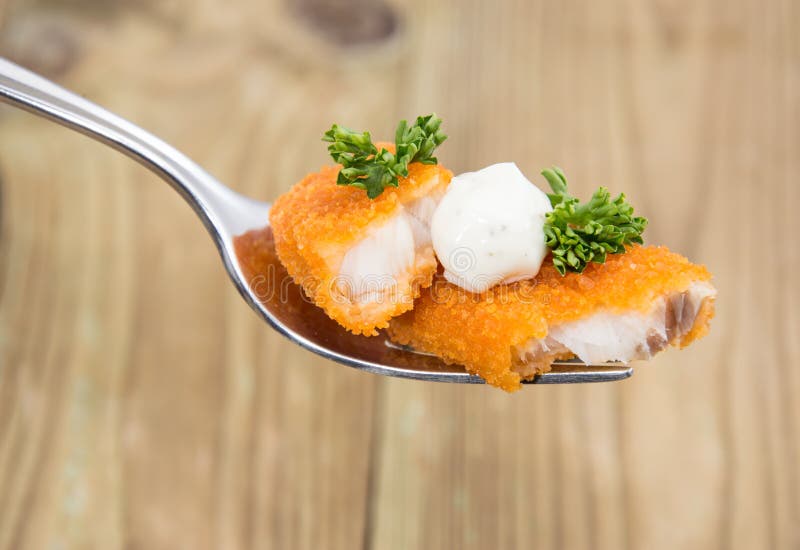 Pieces of Fried Fish on a Fork Stock Photo - Image of nutrition ...
