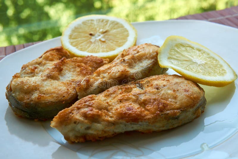 Pieces of Fried Fish with Lemon Wedges. Stock Image - Image of beans ...