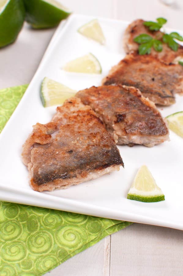 Pieces of Fried Fish on the Square Plate Stock Image - Image of white ...