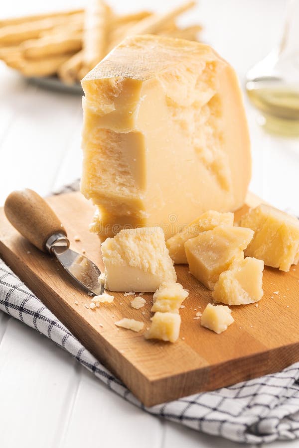Pieces of Italian Parmesan Cheese. Block of Parmesan Stock Image ...