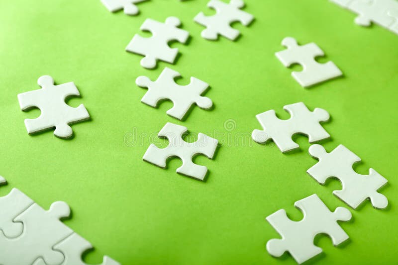 Pieces of Jigsaw Puzzle on Color Background Stock Photo - Image of ...