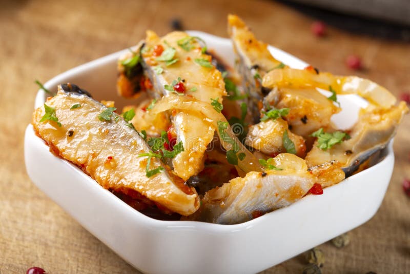 Marinated Herring Fish with Onion and Tomato Sauce in White Bowl Stock ...