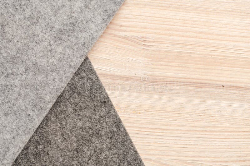 Pieces of Natural Felt on a Wooden Table. Top View Copy Space Stock ...