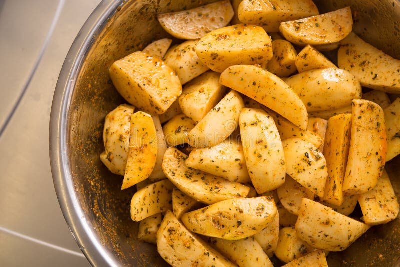 Pieces of pickled potato stock image. Image of herb - 148251765