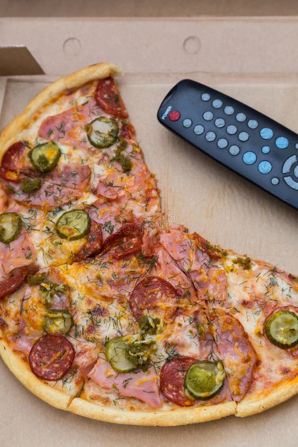 Pieces Pizza in Box with Tv Remote Control Stock Image - Image of ...